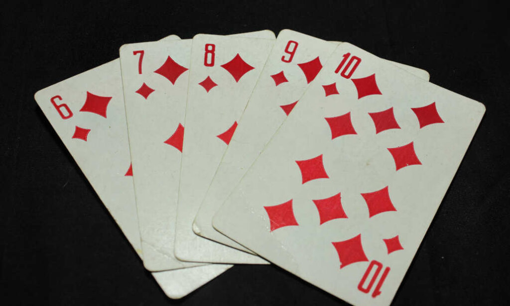 Does a Straight Flush Beat Four of a Kind in Poker & Why?