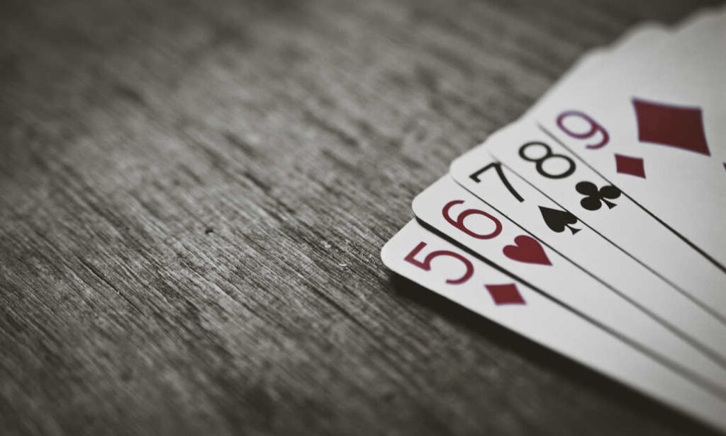 Does Three of a Kind Beat a Straight in Poker & Why?